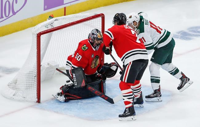 Hockey News - Crawford registers 39 saves, Blackhawks beat Wild 3-1