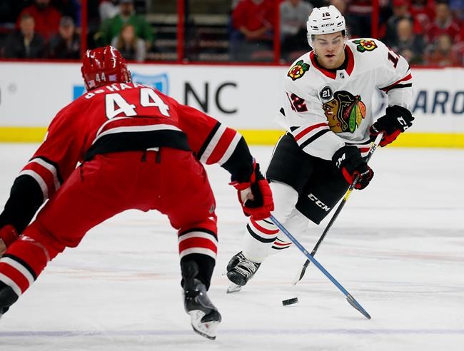Hockey News - Aho scores in OT, Hurricanes beat Blackhawks 3-2