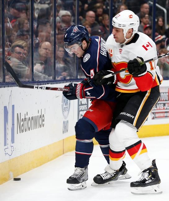 Hockey News - Flames' Lucic suspended 2 games for roughing Sherwood