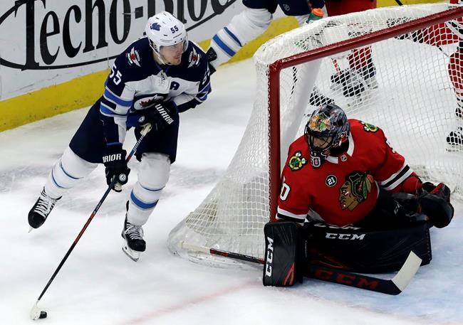 Hockey News - Scheifele sends Jets past Blackhawks 4-3 in OT